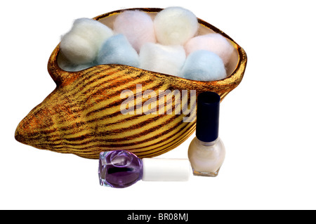 Periwinkle filled with colored cotton balls spilled Stock Photo - Alamy