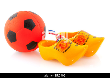Dutch soccer with ball and wooden clogs Stock Photo - Alamy