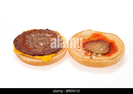 Single Mcdonalds cheeseburger in bread bun on white background, cut out ...