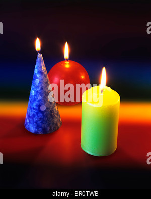 Candlelit background. Red and blue candles closeup Stock Photo - Alamy