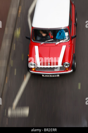 A blurred moving Mini Cooper at speed motion blur on 'The Strand' at ...