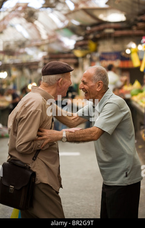 Two old friends greet each other in Xela, Guatemala Stock Photo - Alamy