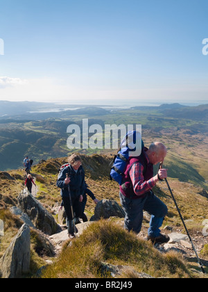 Group of Welsh Ramblers walking up Cnicht mountain in Snowdonia ...