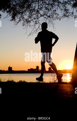 Man running along the East River in New York City Stock Photo - Alamy