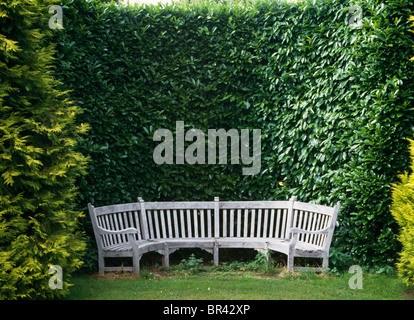 Large curved wooden garden bench seat, Coton Manor Gardens ...