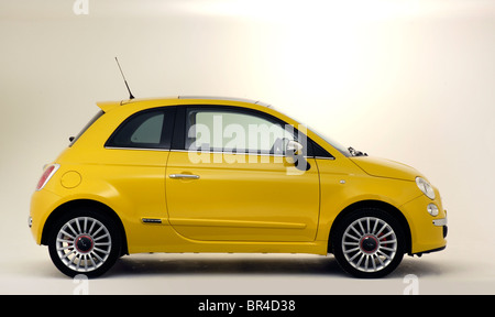 Yellow Fiat 500 car side view isolated on white background Stock Photo ...