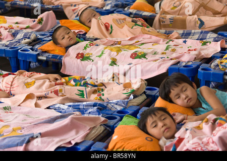 Children take a nap in the kindergarten, Dunhuang, Gansu Province ...