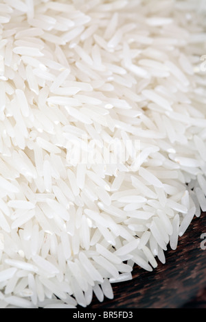 White bowl full of uncooked Basmati rice Stock Photo - Alamy