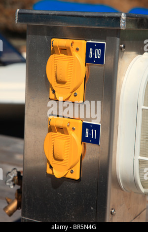 Power outlets at a marina Stock Photo - Alamy