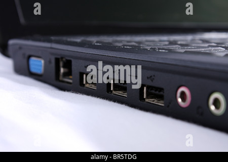 Side of laptop showing connector ports and keyboard Stock Photo - Alamy