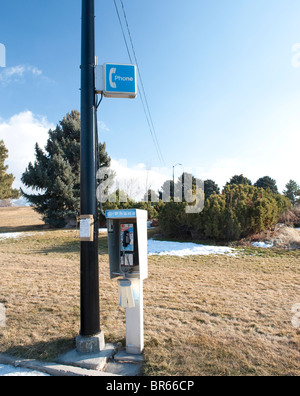 Sign for a public pay phone Stock Photo - Alamy