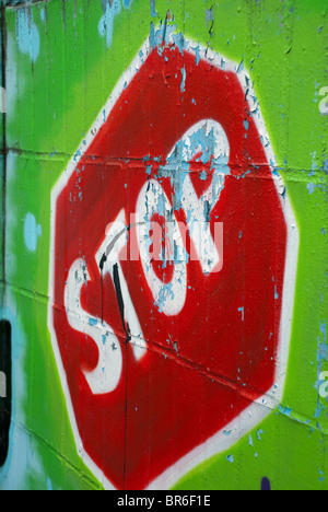 Stop Sign graffitti Stock Photo - Alamy