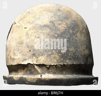 A Negau helmet - Vetulonia type,5th century B.C.Bronze.High skull with ...