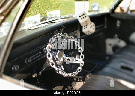Chain link steering wheel of a low rider car on display Stock Photo - Alamy