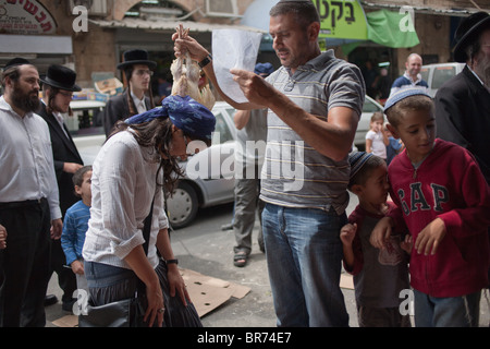 Just a few hours ahead of Yom Kippur religious Jews perform Kapparot ...