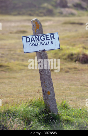 Warning sign on golf course Stock Photo - Alamy