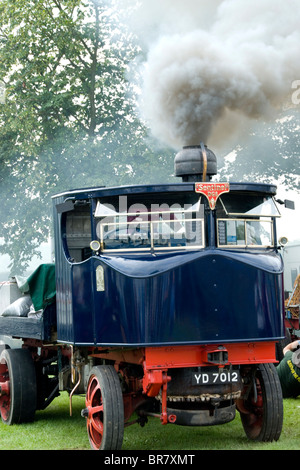 A steam traction engine and Sentinel steam lorry side by side at a ...