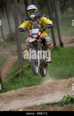 A rider jumps at a motocross event Stock Photo - Alamy