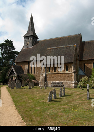 St Peter's Church in Hascombe village in the Surrey Hills AONB, England, UK. Interior view with ...
