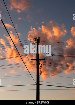 Clouds and utility pole Stock Photo - Alamy