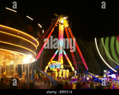 Witney Feast Golden Gallopers at night Stock Photo - Alamy