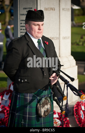 Scouts and Guides on parade at a Remembrance Day Service in Carluke ...