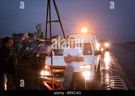 Storm chasing. Tornado researchers outside a Multi-beam Rapid-Scan ...