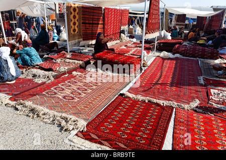 Turkmenistan - Ashgabat - Sunday Market carpet stall Stock Photo - Alamy