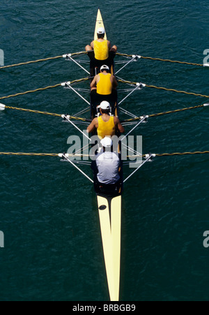 Rowing foursome gets ready for race Stock Photo - Alamy