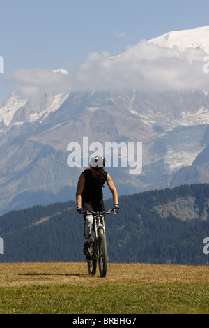 Mountain bike in the French Alps. Mont Blanc massif. France Stock Photo ...