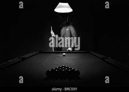 Mystery Pool Player Behind Rack Of Billiard Balls Stock Photo - Alamy