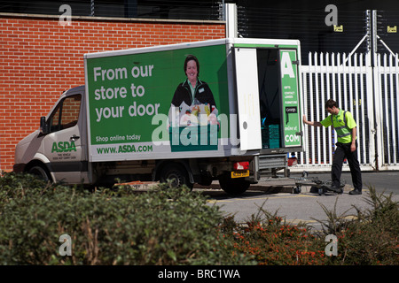 Asda home delivery vans loading up deliveries at Asda supermarket store ...