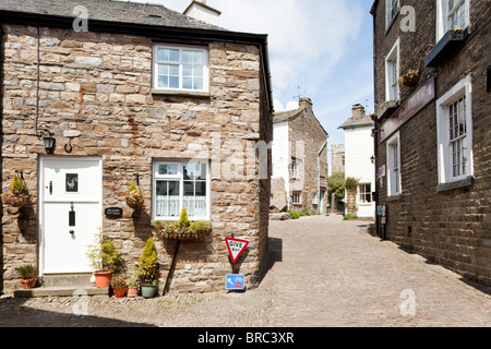 Cobbled main street of Dent village in the Yorkshire Dales National ...