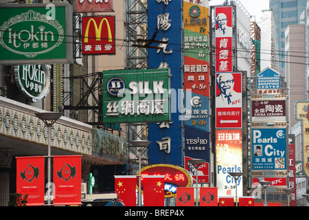 Chinese shop fronts with colourful signs in a suburb of Beijing, China ...