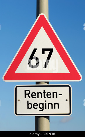 Warning label retirement age of 67 Stock Photo - Alamy