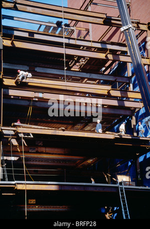 Construction building industry site workers below diagonal shoring ...
