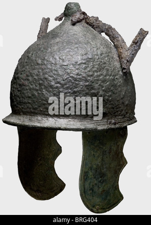 A set of Greek-Etruscan armour, 4th/3rd century B.C. A helmet of the ...