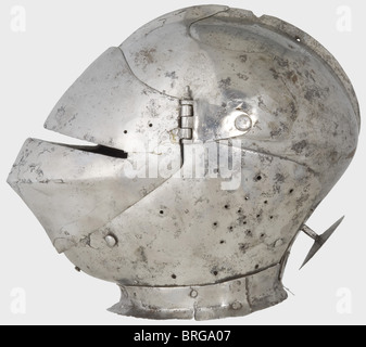 An Italian armet,15th century Hammered,one-piece iron skull with low ...
