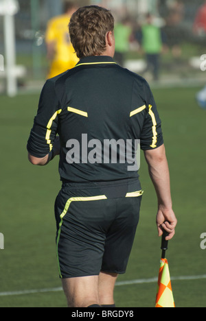 Side referee going along of the pitch border Stock Photo - Alamy