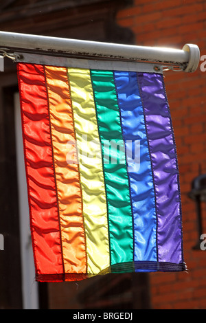 LGBT flag in Soho,London. People walking in Soho London,Brewer street ...