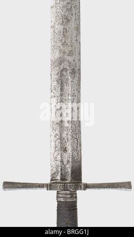 A German executioner's sword,dated 1692 Heavy,double-edged blade with ...