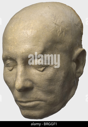 African masks hanging on a wire mesh stand at Greenmarket Square street ...