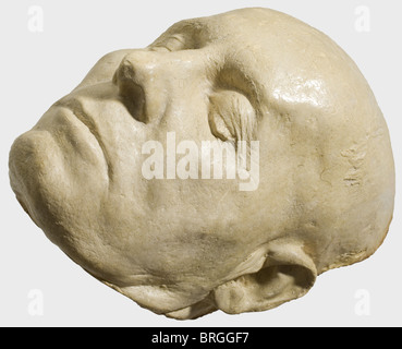 African masks hanging on a wire mesh stand at Greenmarket Square street ...