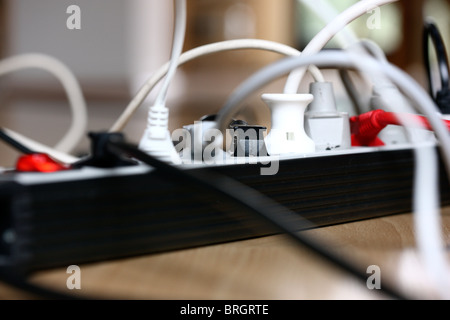 Home electrics, multi socket, power lines, plug board, plugs and ...