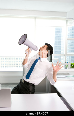 Getting loud in the office Stock Photo - Alamy