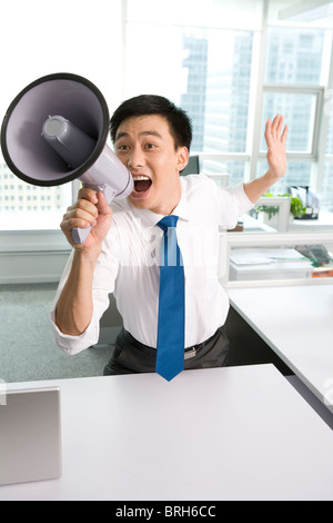 Getting loud in the office Stock Photo - Alamy