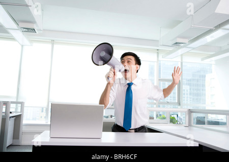 Getting loud in the office Stock Photo - Alamy