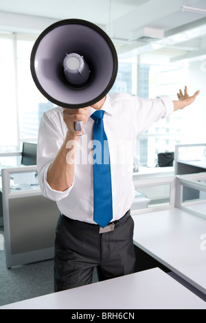 Getting loud in the office Stock Photo - Alamy