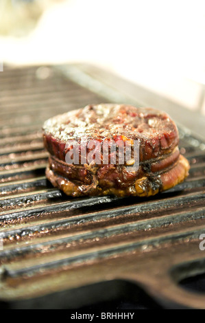 A close-up of a steak being cooked on a hot grill Stock Photo - Alamy