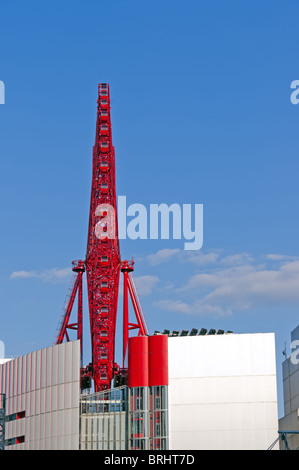 Osaka HEP FIVE Ferris Wheel seems at the behind of a building. Osaka ...